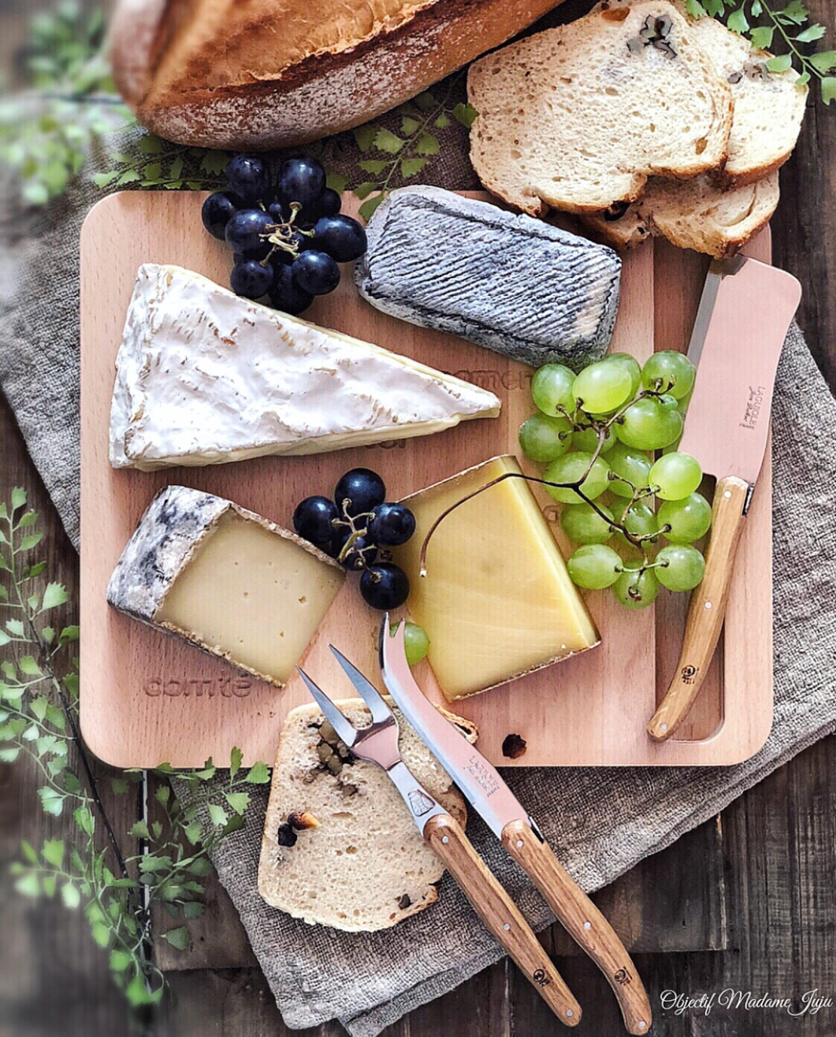 Natural beech wood cheese board with Laguiole cheese knife